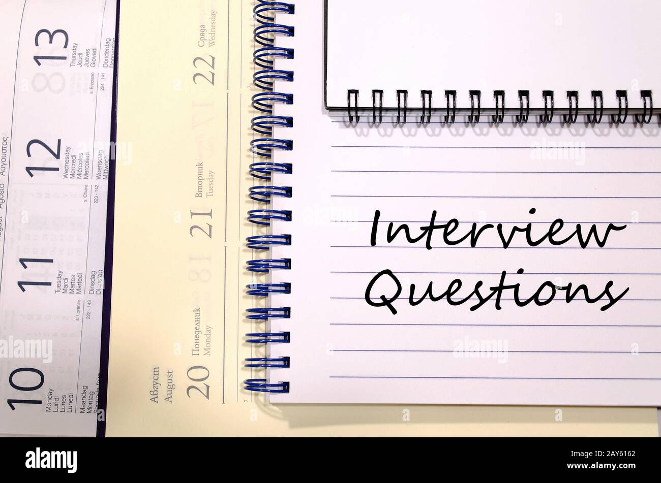 Interview questions write on notebook Stock Photo - Alamy