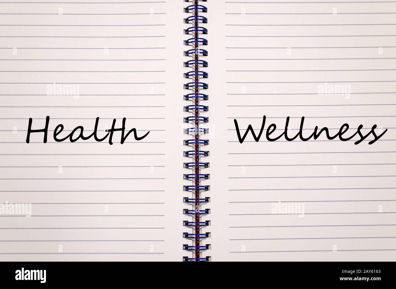 Health and wellness write on notebook Stock Photo - Alamy