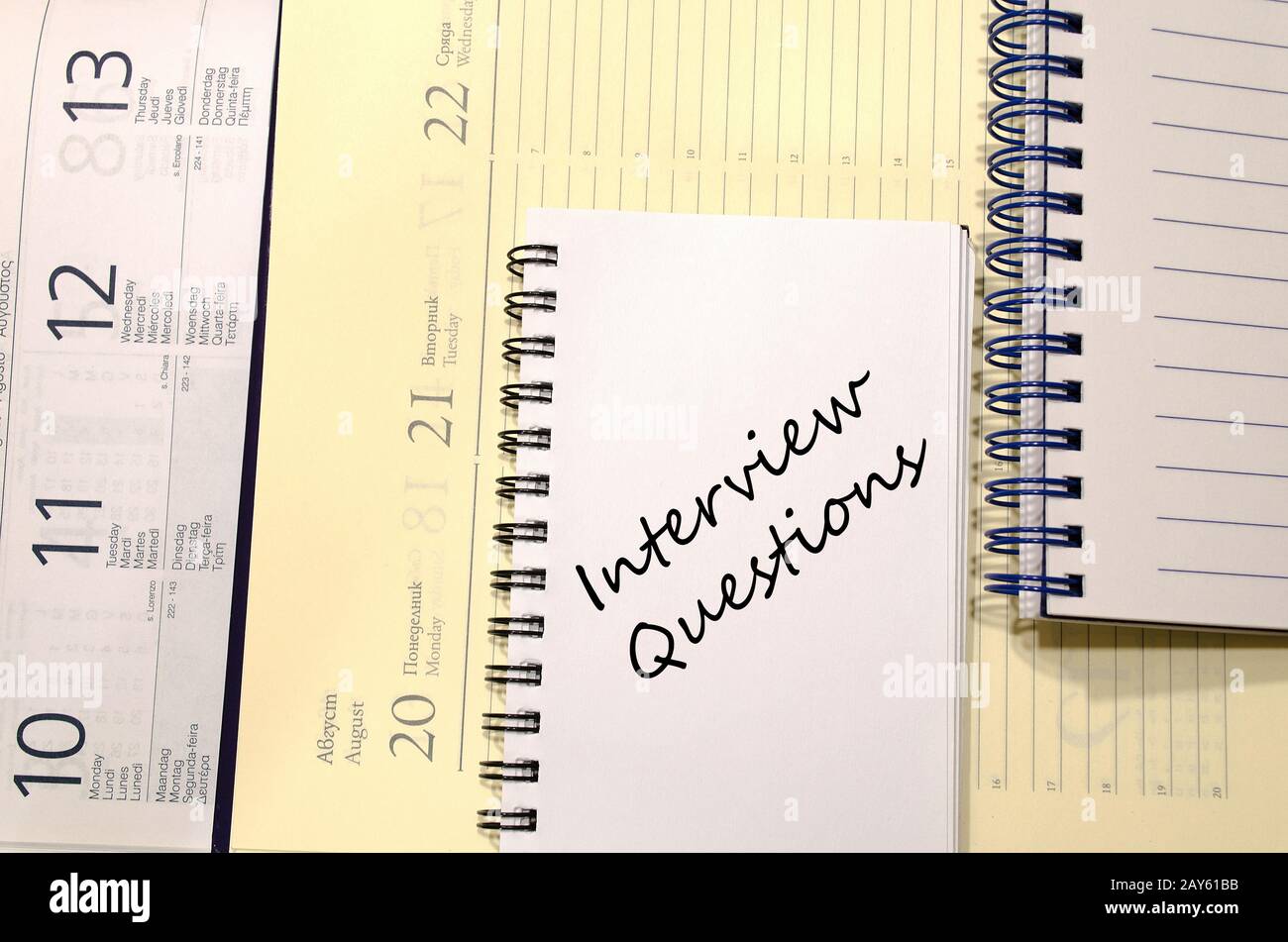 Interview questions write on notebook Stock Photo - Alamy