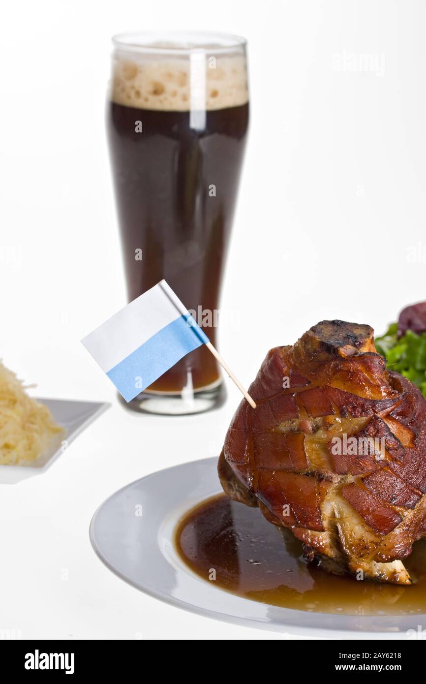 Bavarian knuckle of pork with wheat beer Stock Photo - Alamy