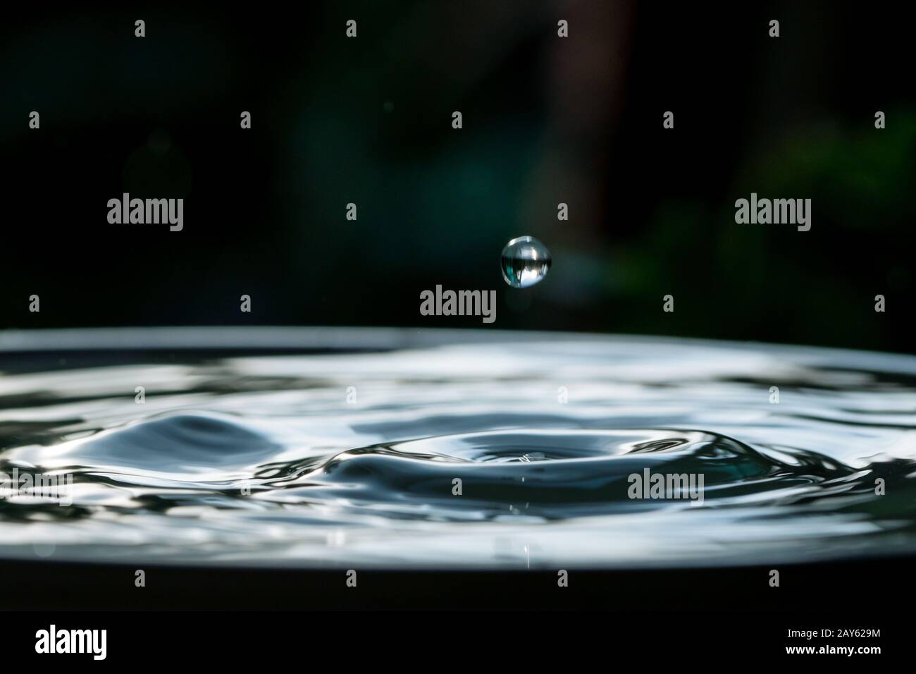 Water Drop splash with sun Stock Photo - Alamy