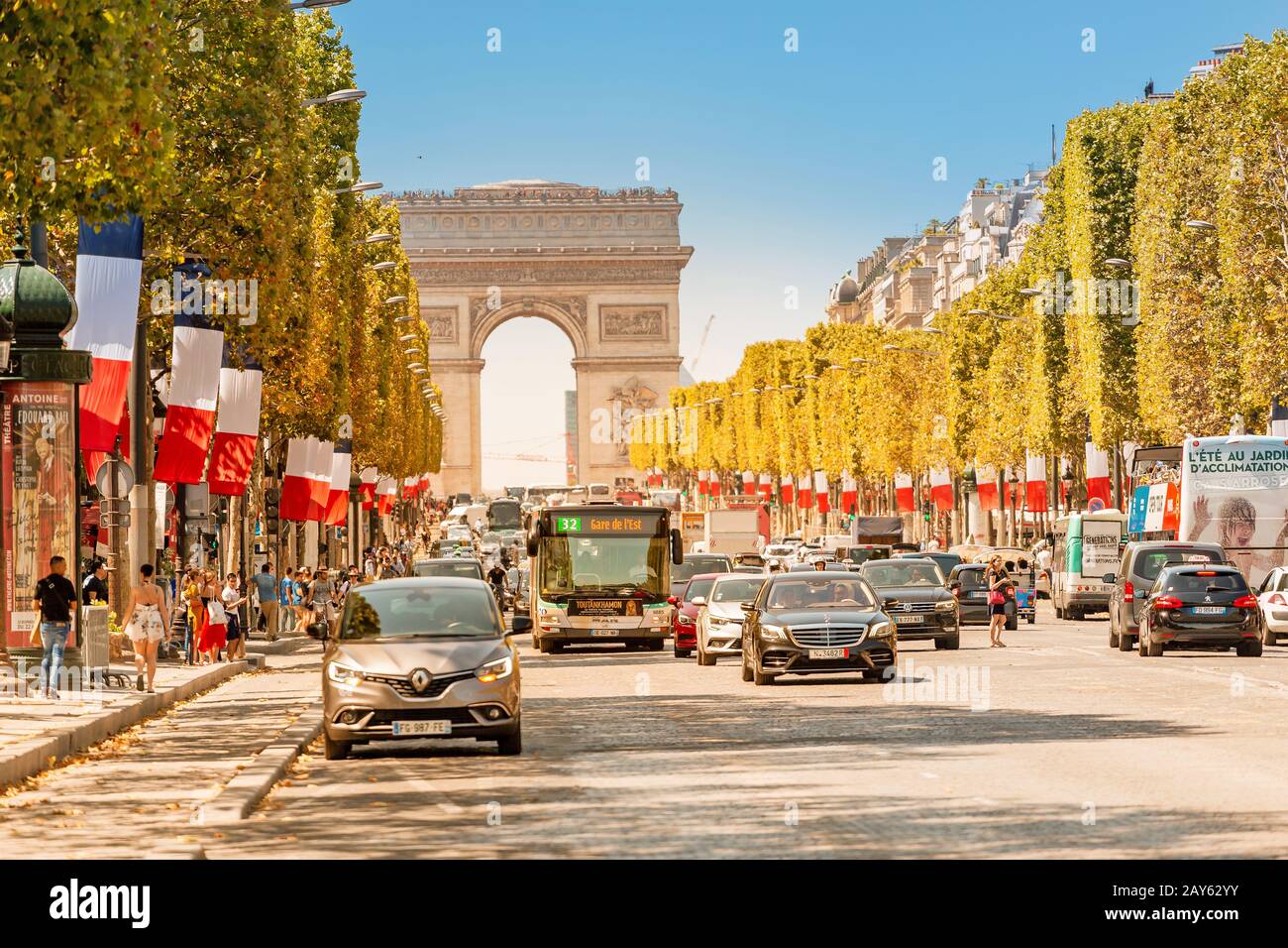 29 July 2019, Paris, France: Buses and cars drive along Avenue Champs ...
