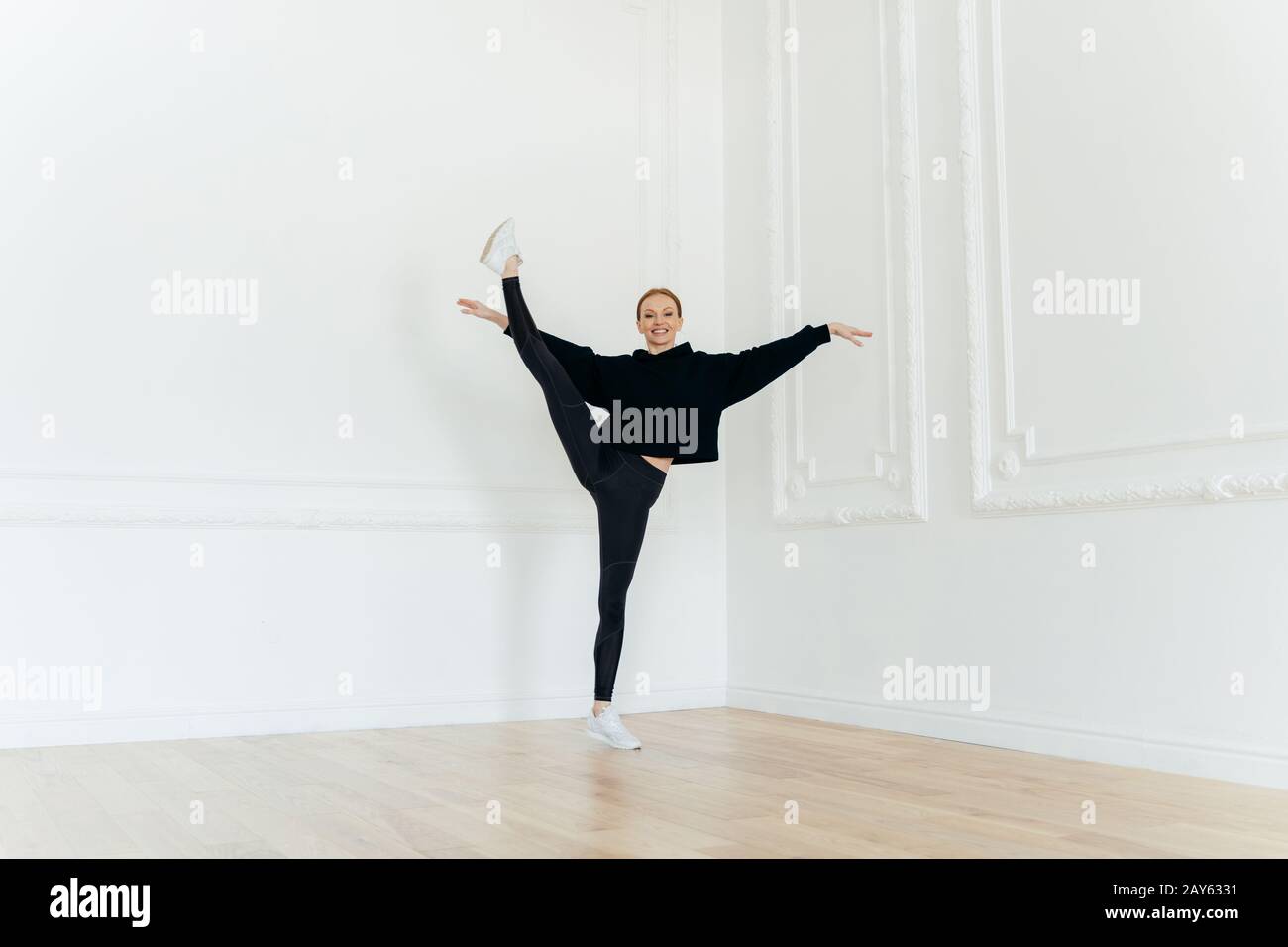 Girl exercises on horizontal hi-res stock photography and images - Alamy