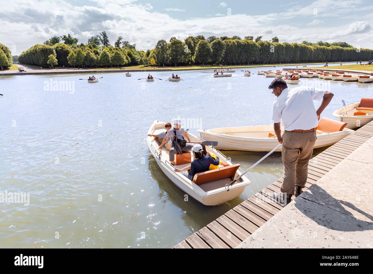 30 July 2019, Versailles, France: Tourists on boats sail along the ...