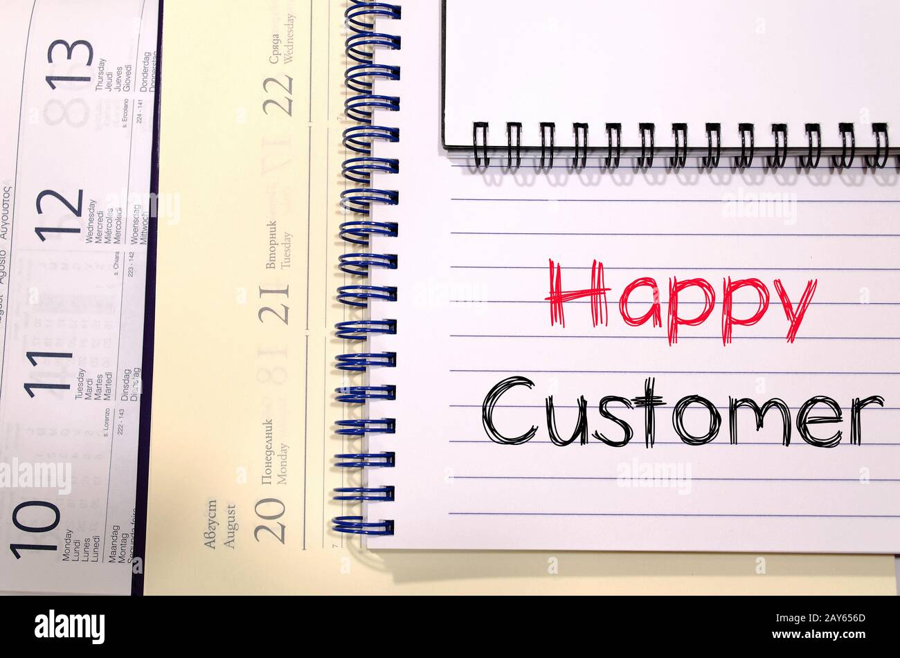 Happy customer text concept on notebook Stock Photo - Alamy