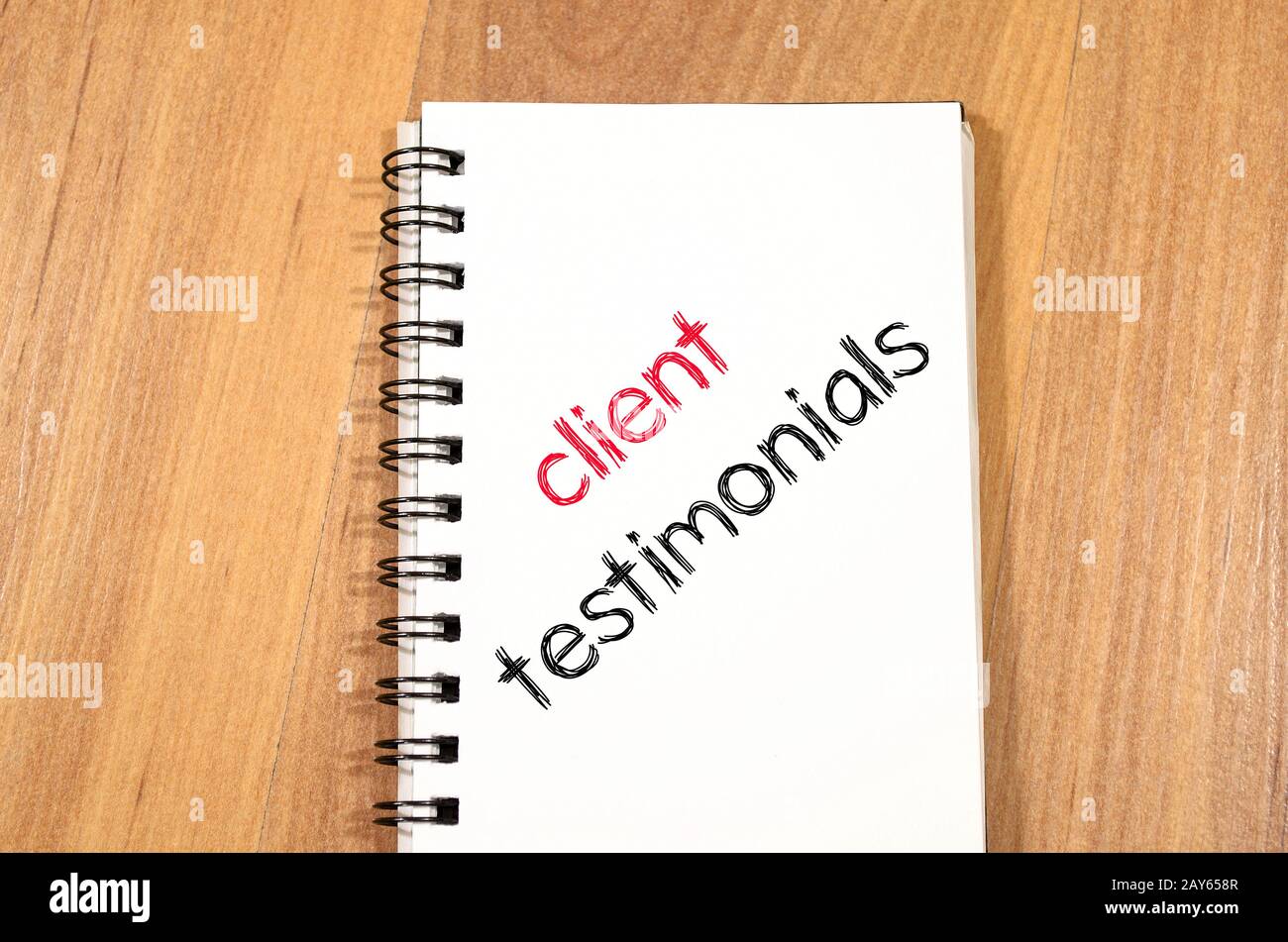 Client testimonials text concept on notebook Stock Photo - Alamy