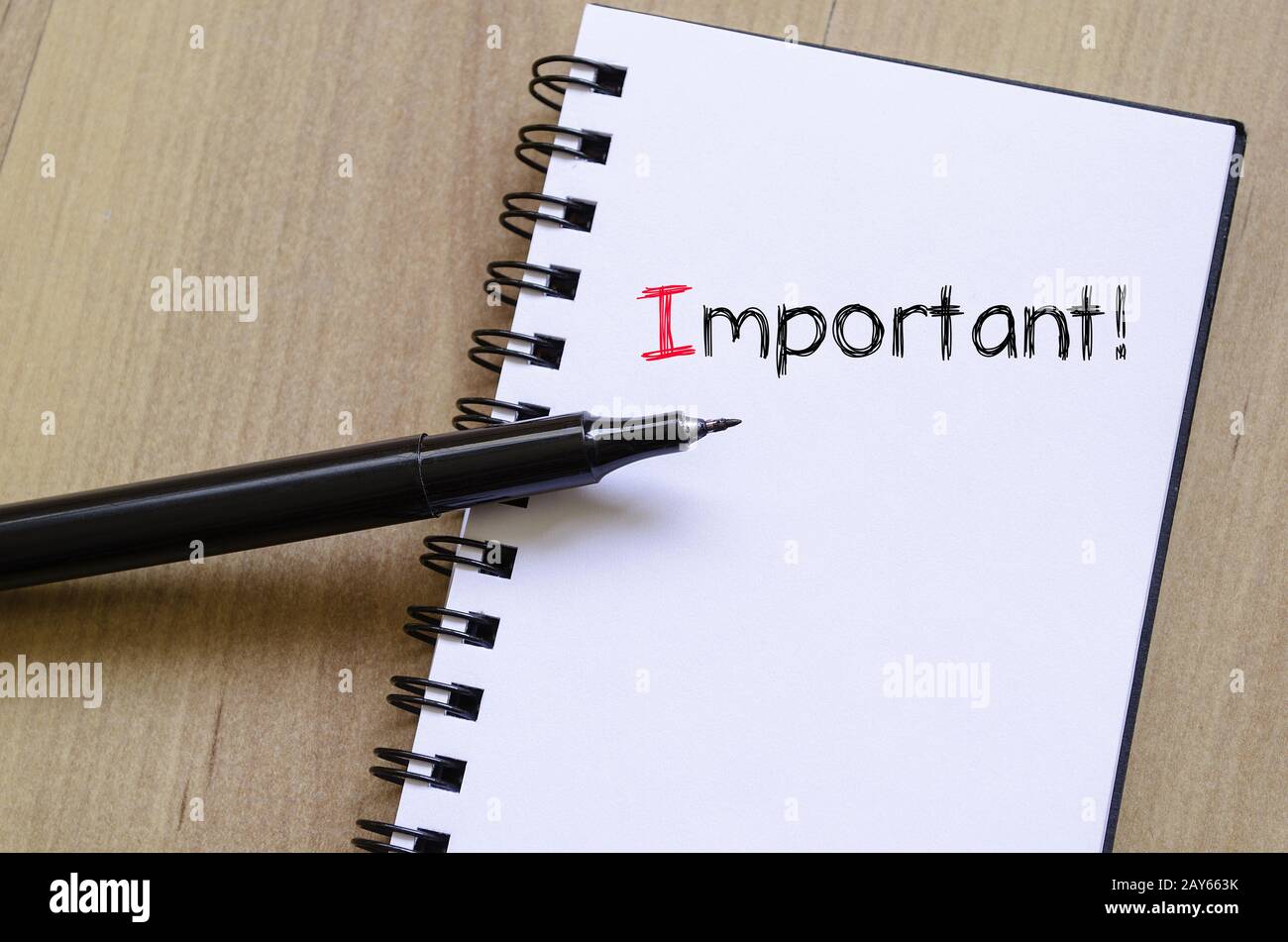 Important text concept on notebook Stock Photo - Alamy