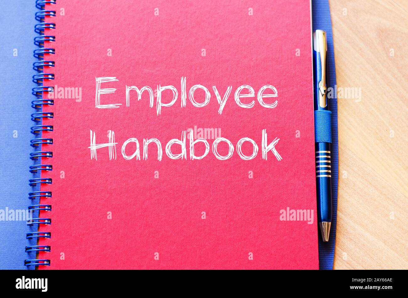 Employee handbook text concept on notebook Stock Photo - Alamy