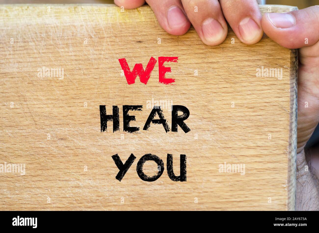 We hear you text concept Stock Photo - Alamy