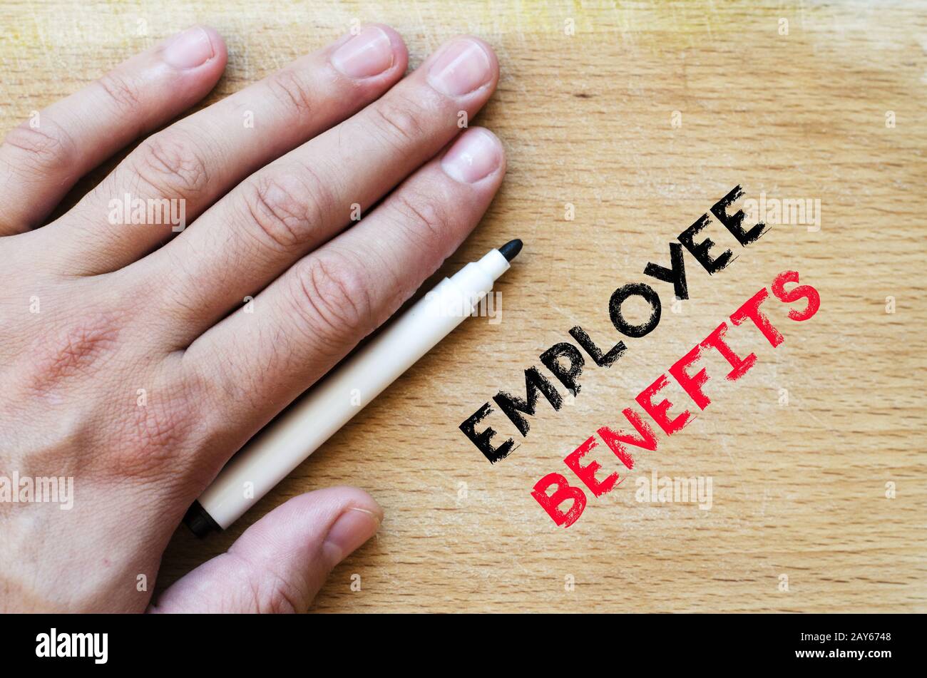 Employee benefits text concept Stock Photo - Alamy