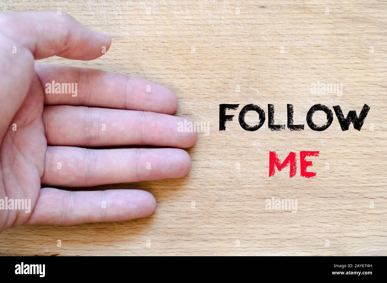 Follow me text concept Stock Photo - Alamy