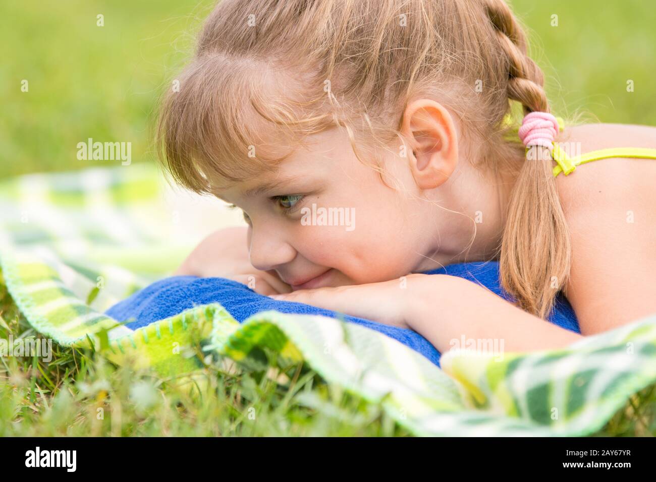 Child touching grass hi-res stock photography and images - Alamy