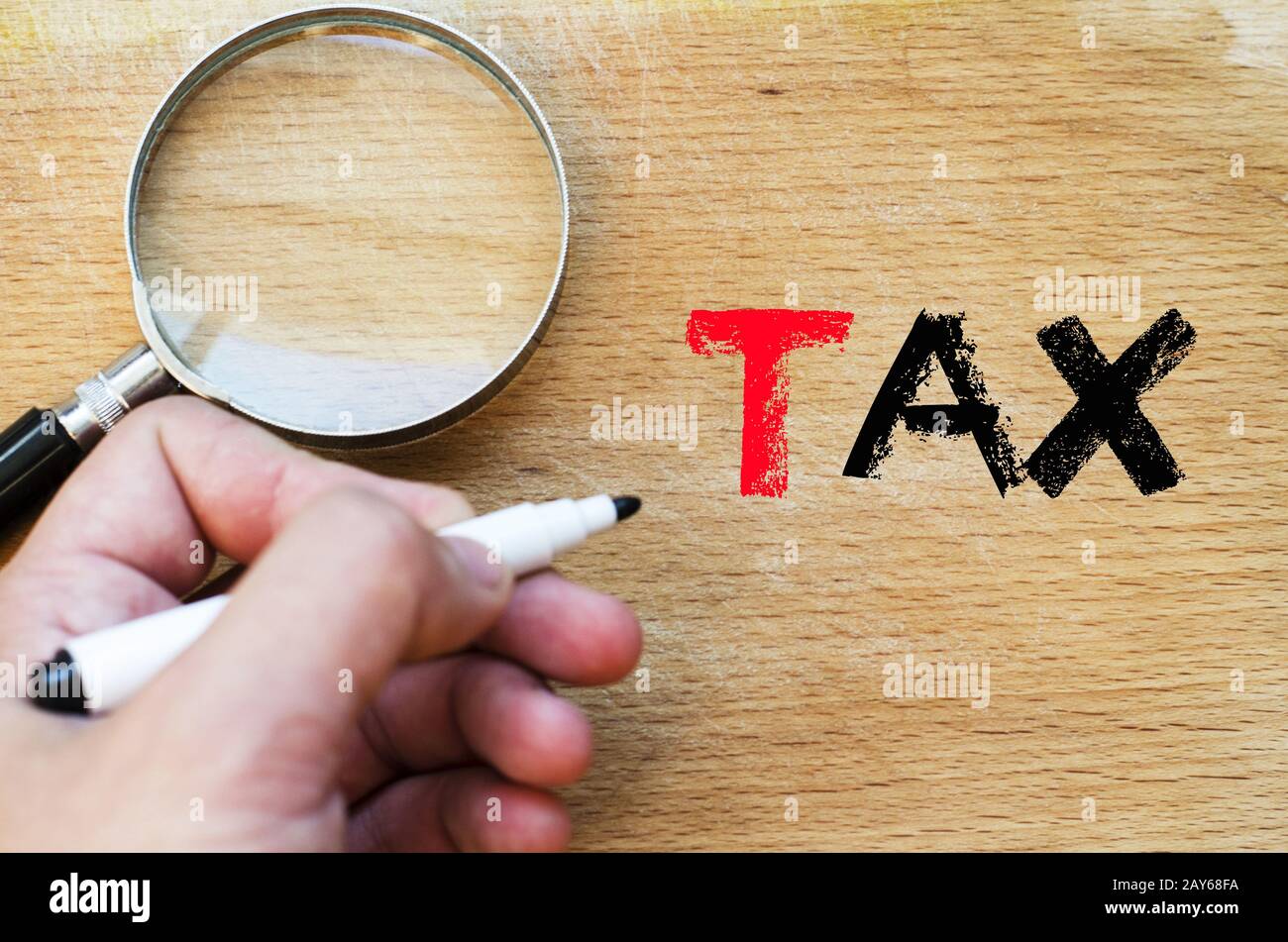 Tax text concept Stock Photo - Alamy