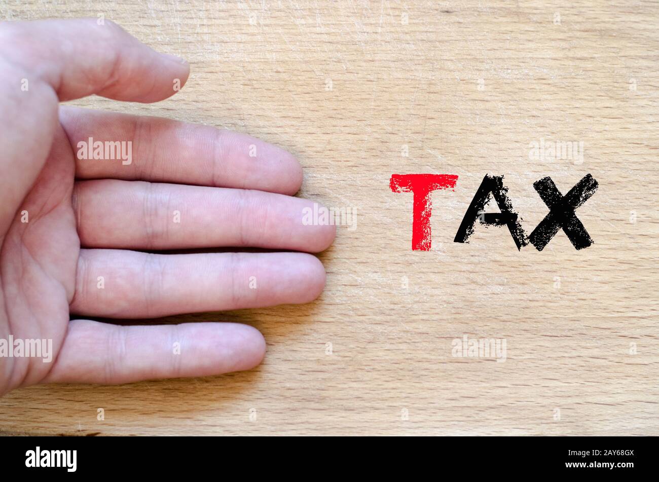 Tax text concept Stock Photo - Alamy