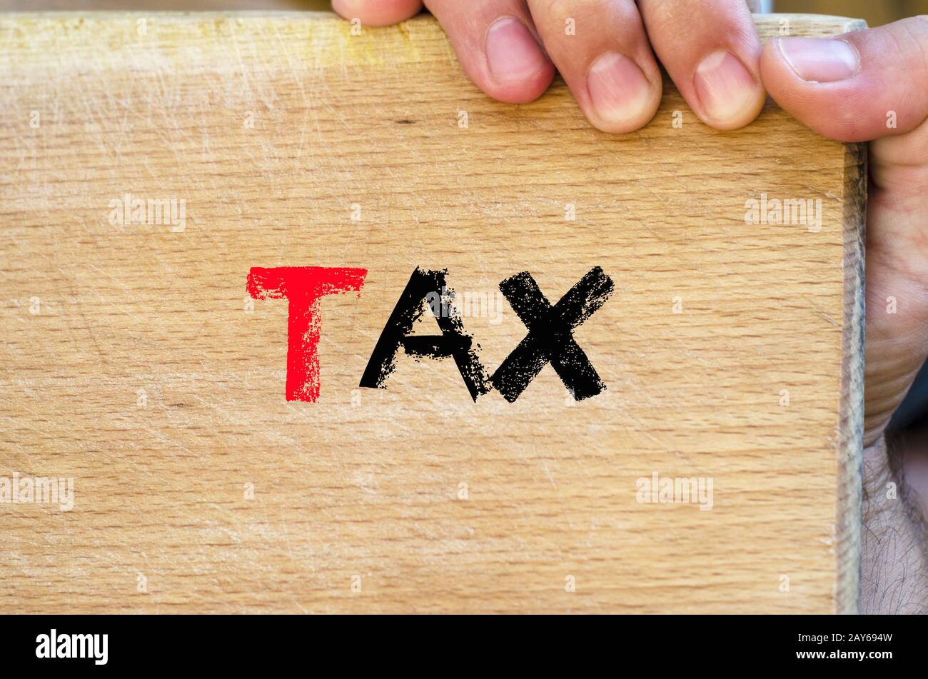 Tax text concept Stock Photo - Alamy