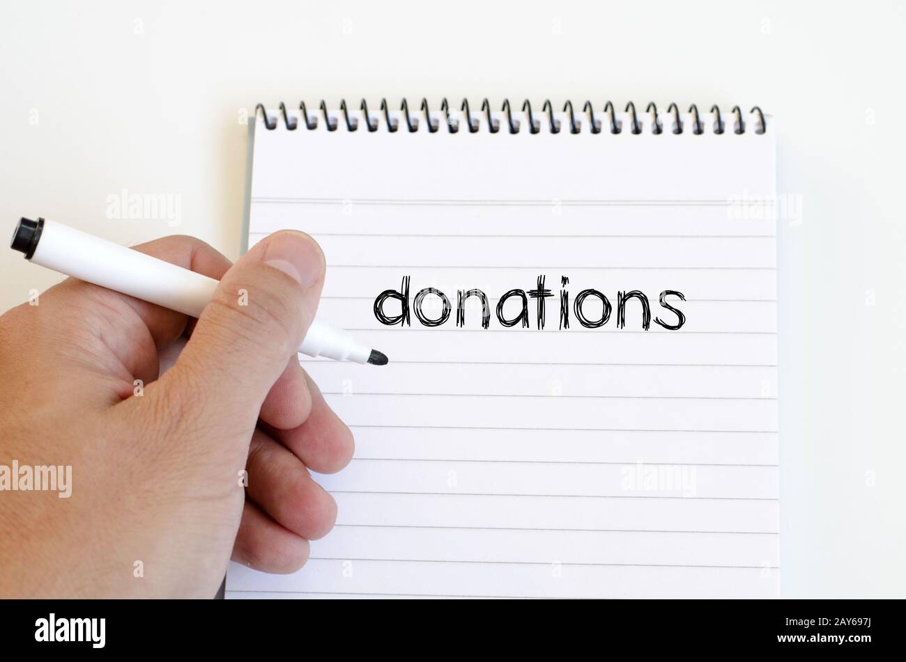 Donations text concept Stock Photo - Alamy