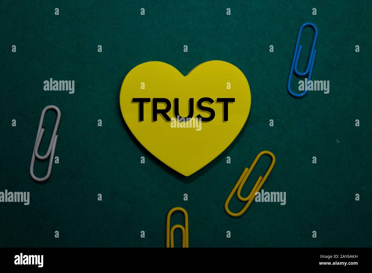 Trust write on a sticky note isolated on Office Desk Stock Photo - Alamy