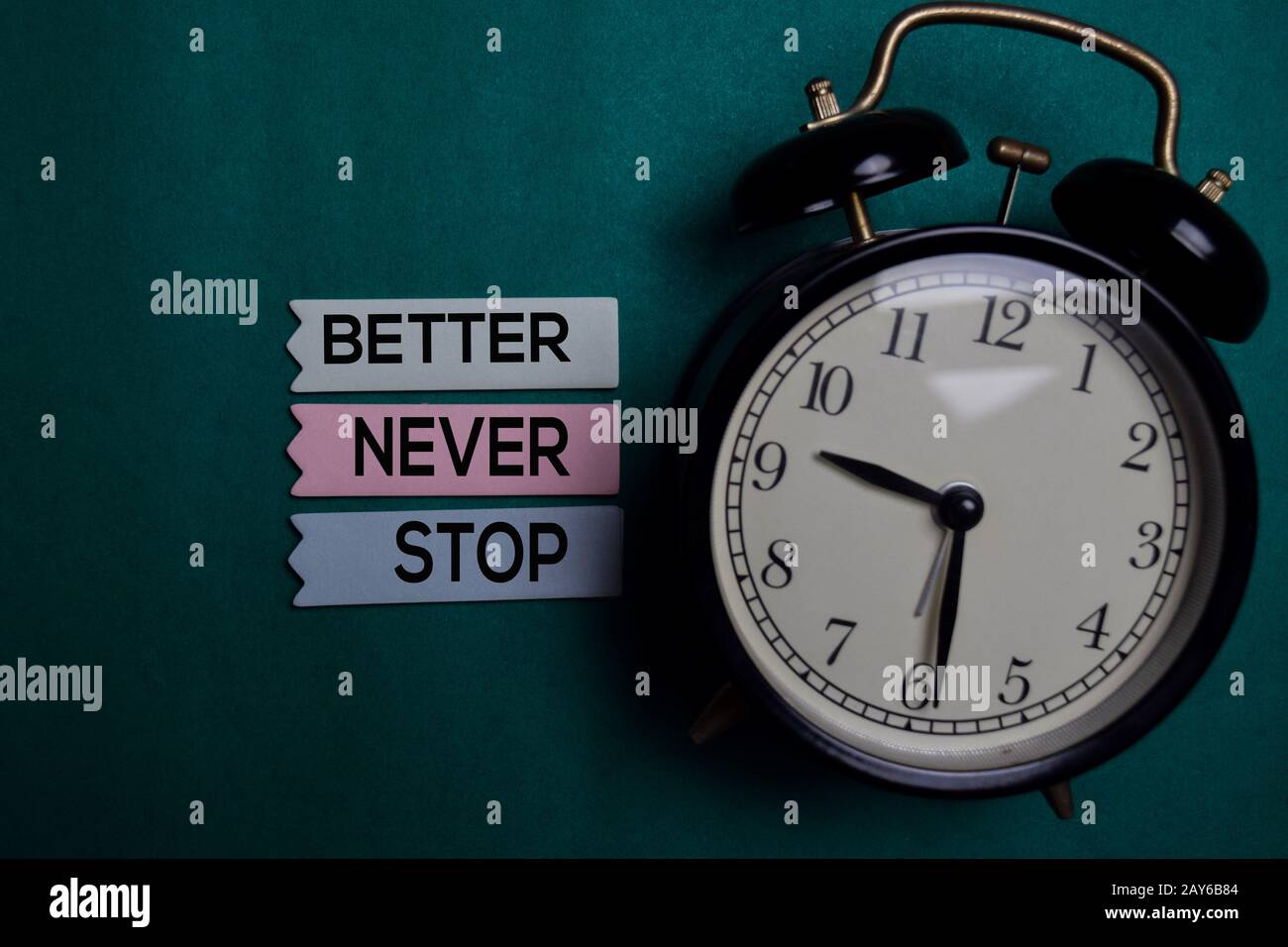 Better Never Stop write on a sticky note isolated on Office Desk Stock ...