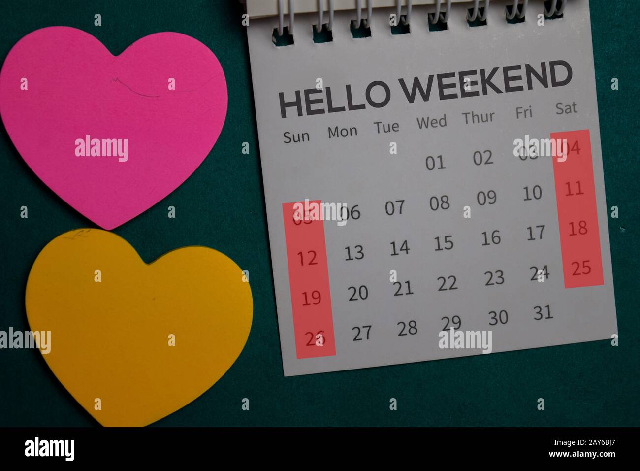 Top view Hello Weekend text on a Calendar isolated on office desk Stock ...