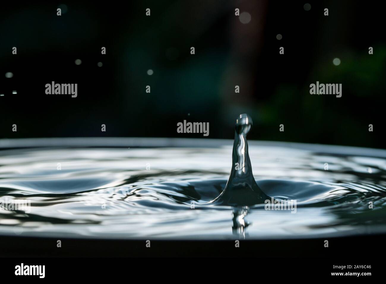 Water Drop splash with sun Stock Photo - Alamy