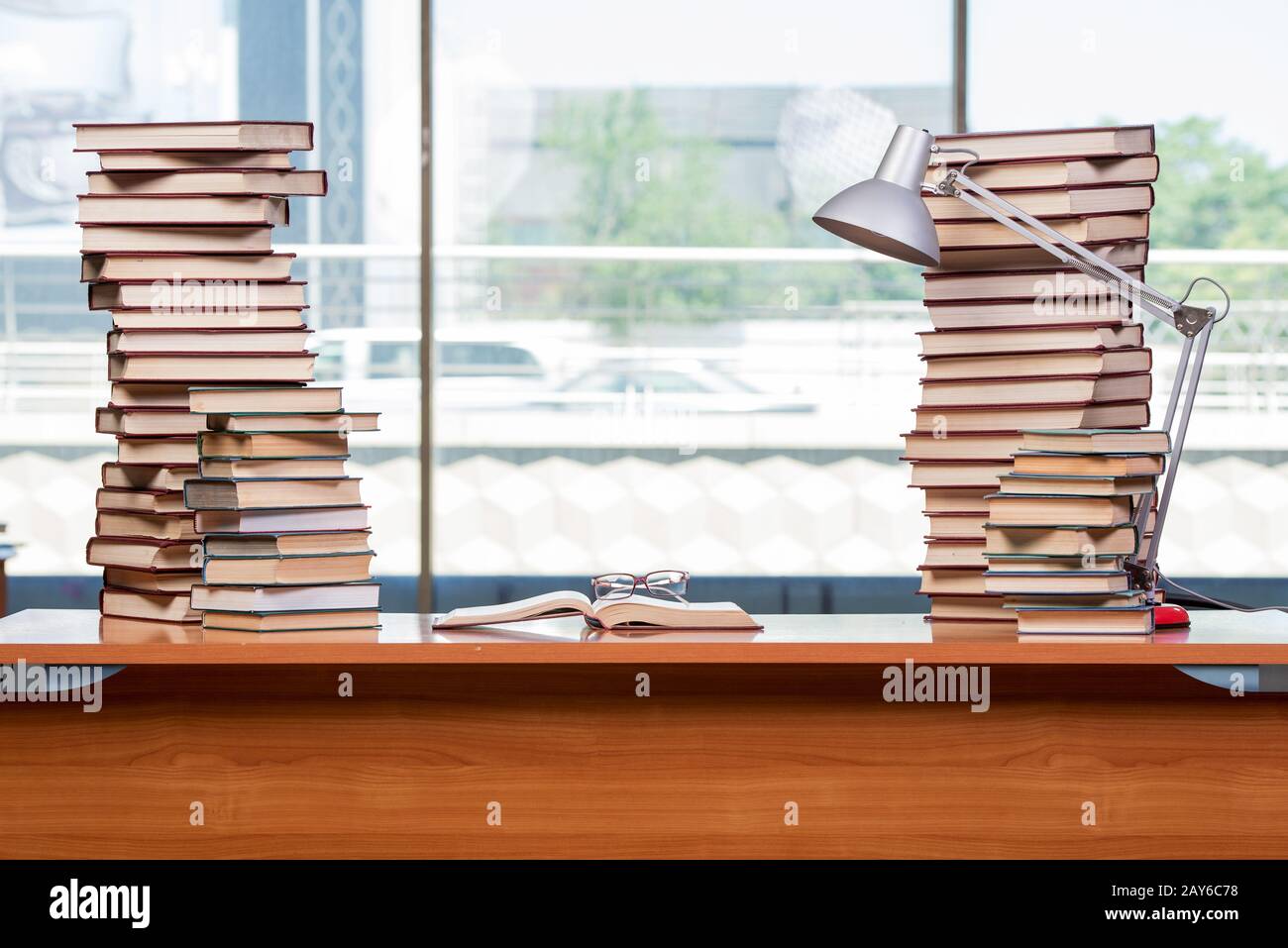 Stack of books on the desk in education concept Stock Photo - Alamy