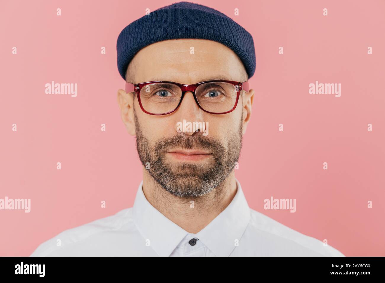 Close Up Shot Of Confident Male Employee With Thick Beard And Mustache