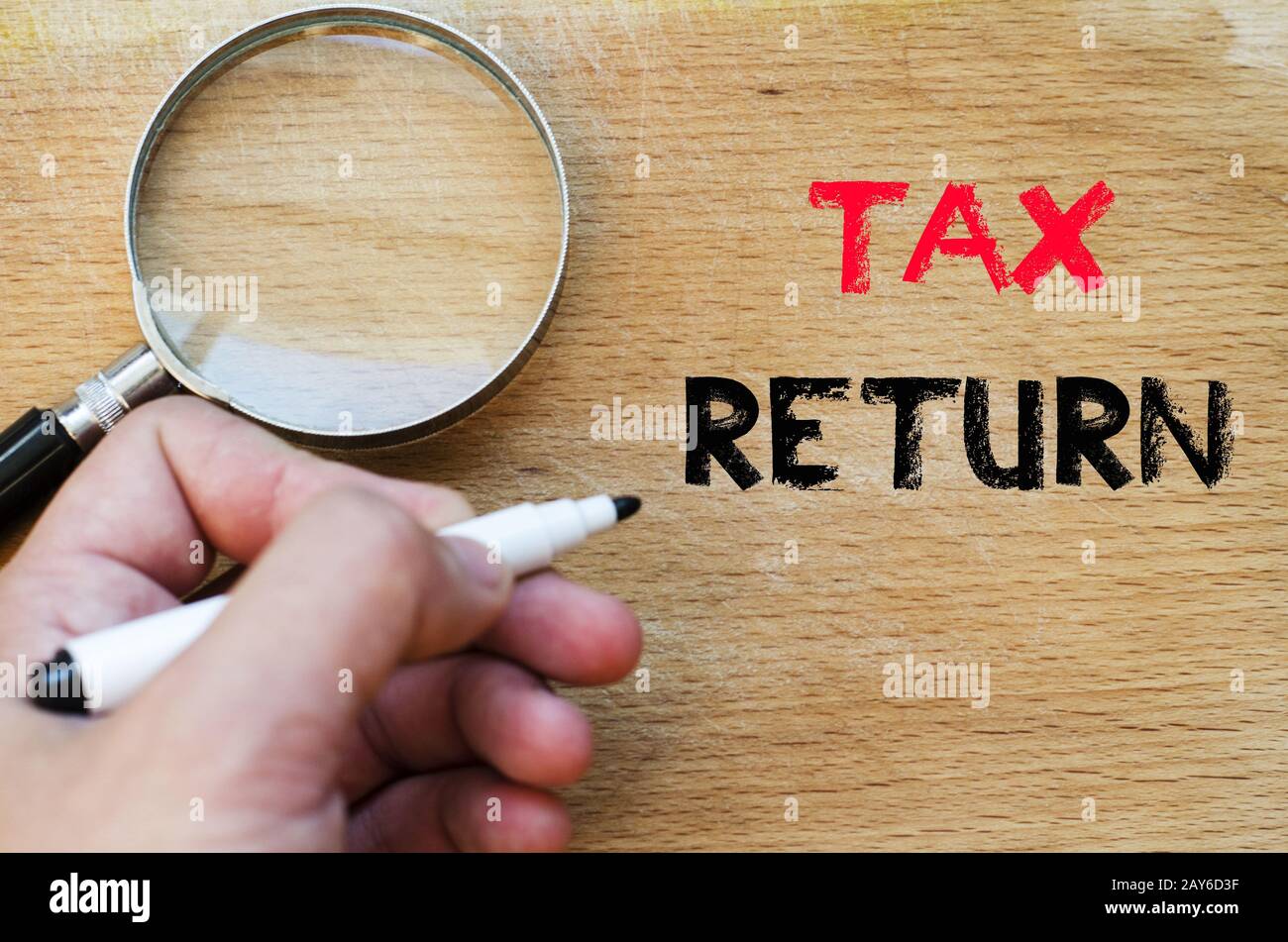 Tax return text concept Stock Photo - Alamy