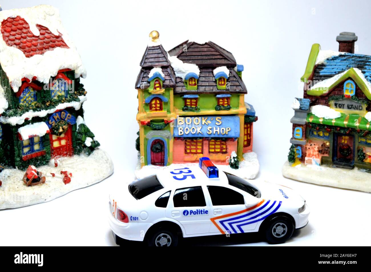 Police car in front of workshops of Christmas on a white bottom Stock ...