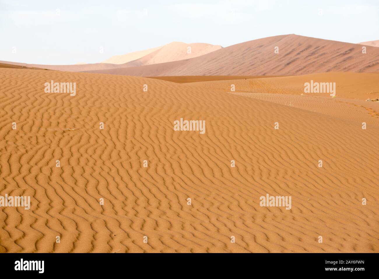 Endless sand waves on a sand dune of Namib Desert Stock Photo - Alamy