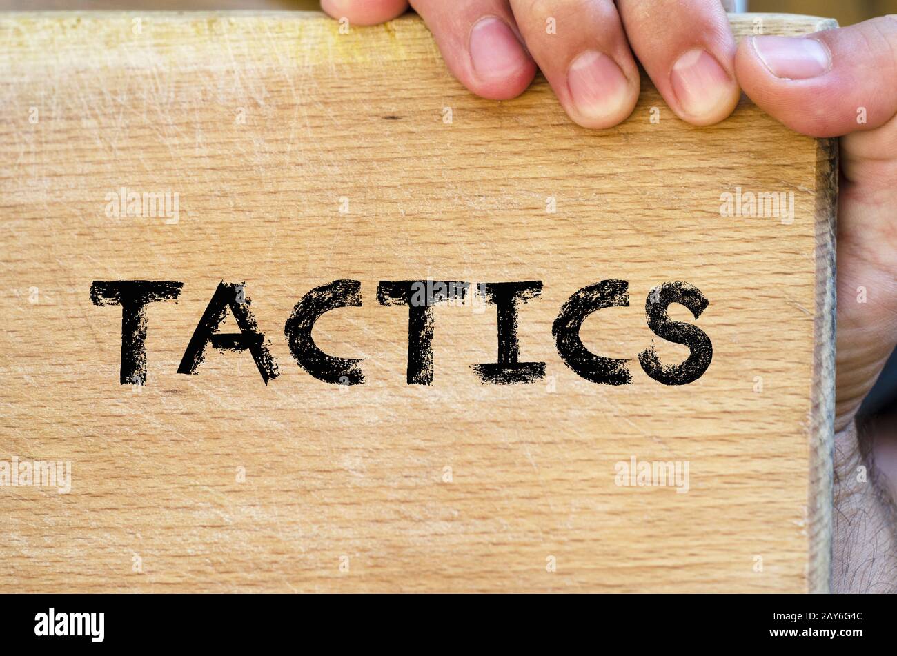 Tactics text concept Stock Photo - Alamy