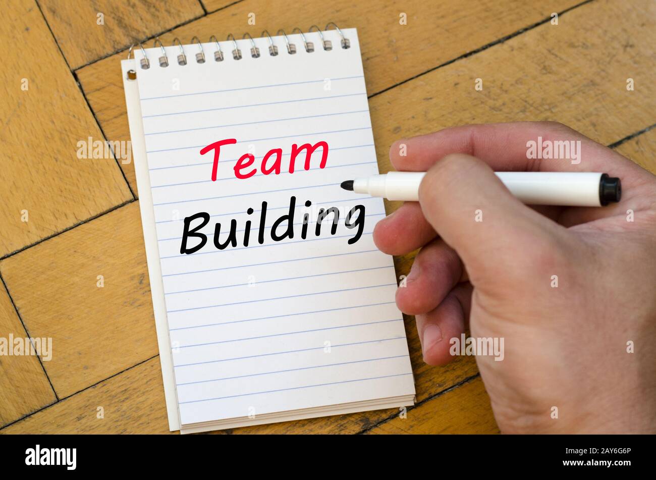 Team building text concept on notebook Stock Photo - Alamy