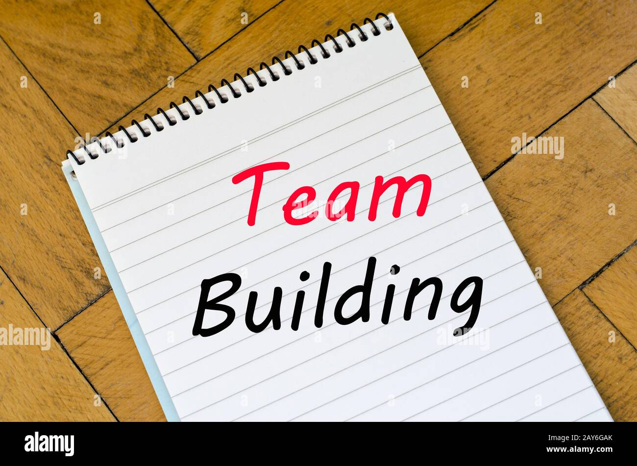 Team building text concept on notebook Stock Photo - Alamy