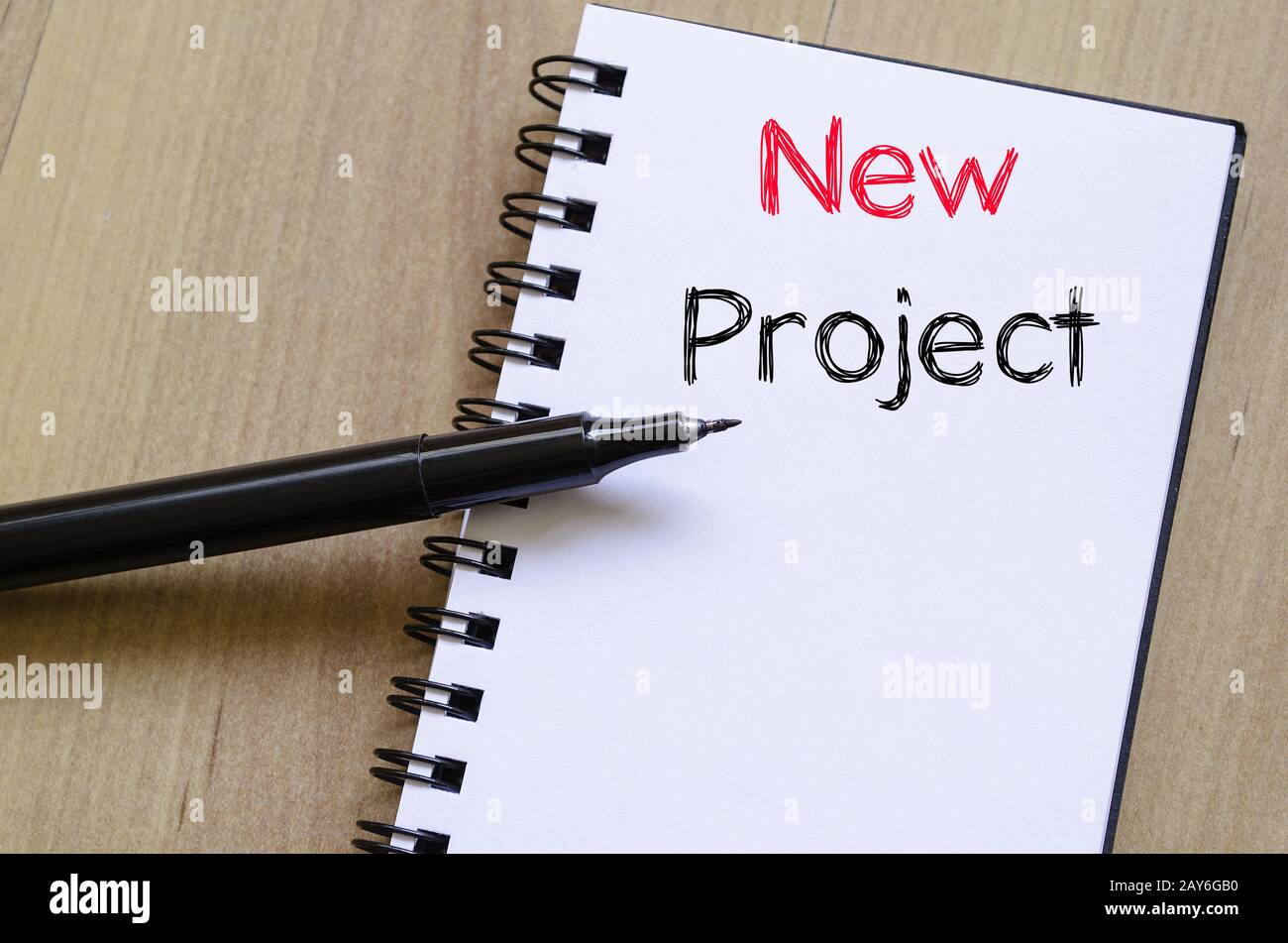 New project text concept on notebook Stock Photo - Alamy
