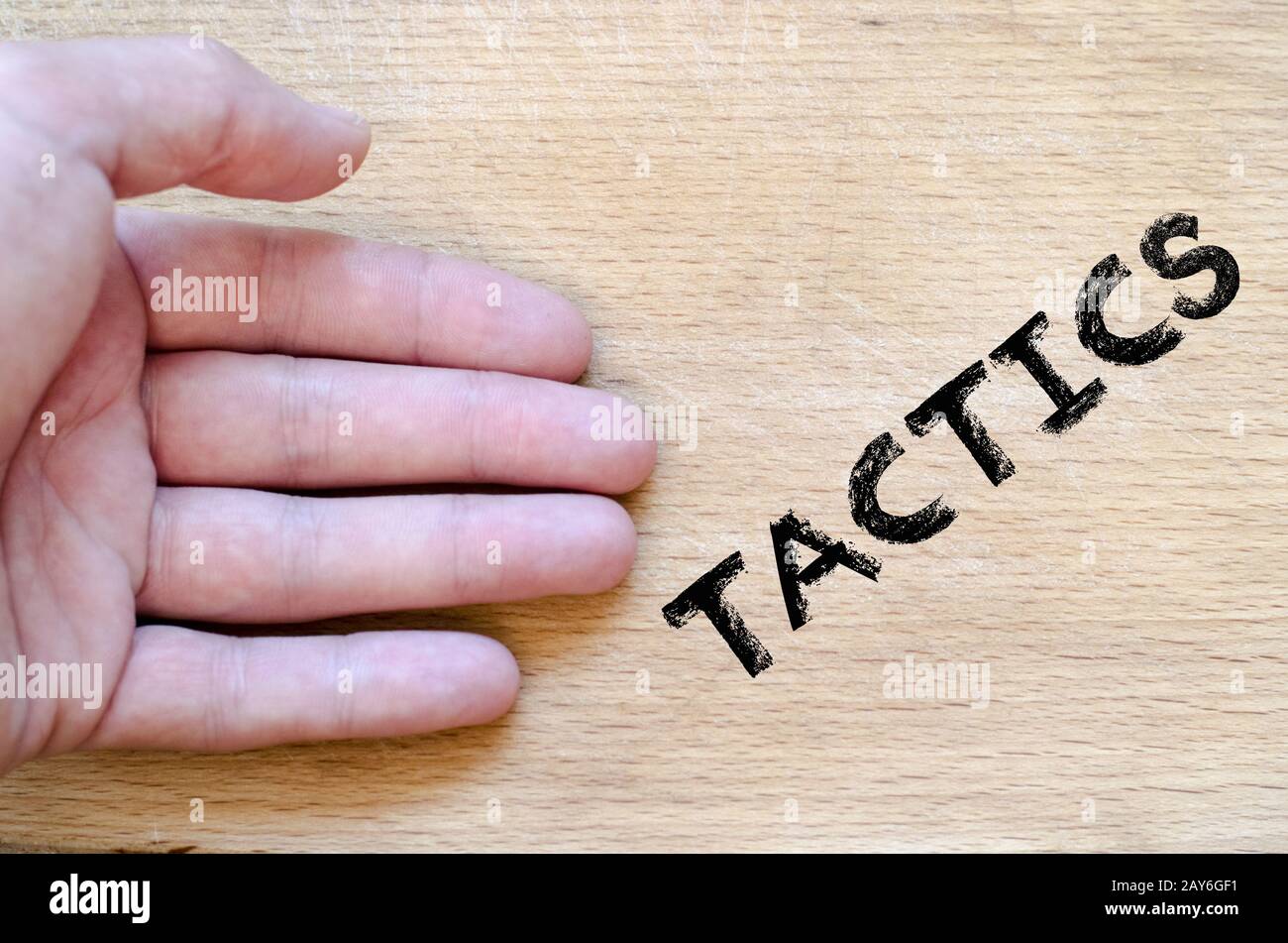 Tactics text concept Stock Photo - Alamy