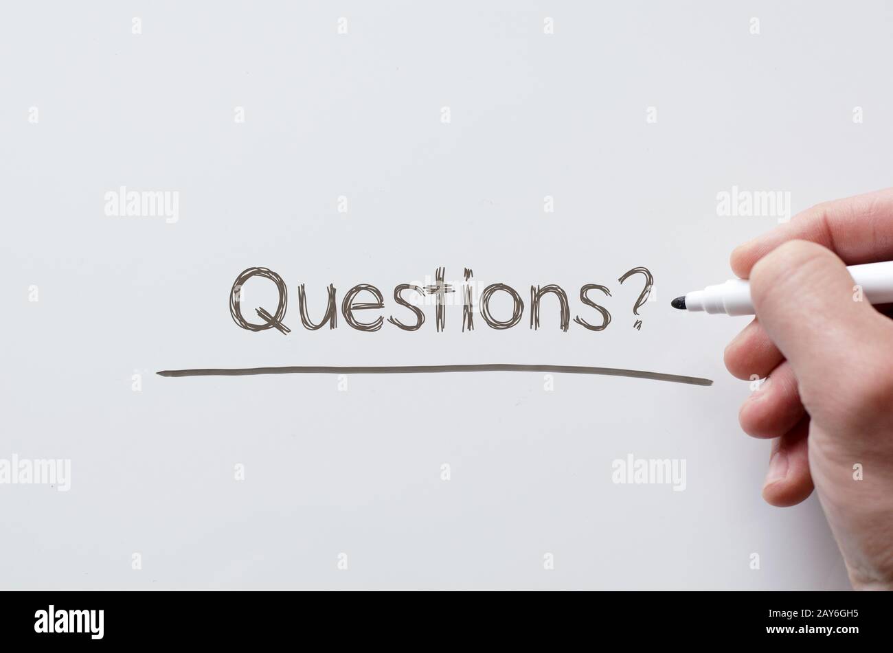 Questions written on whiteboard Stock Photo - Alamy
