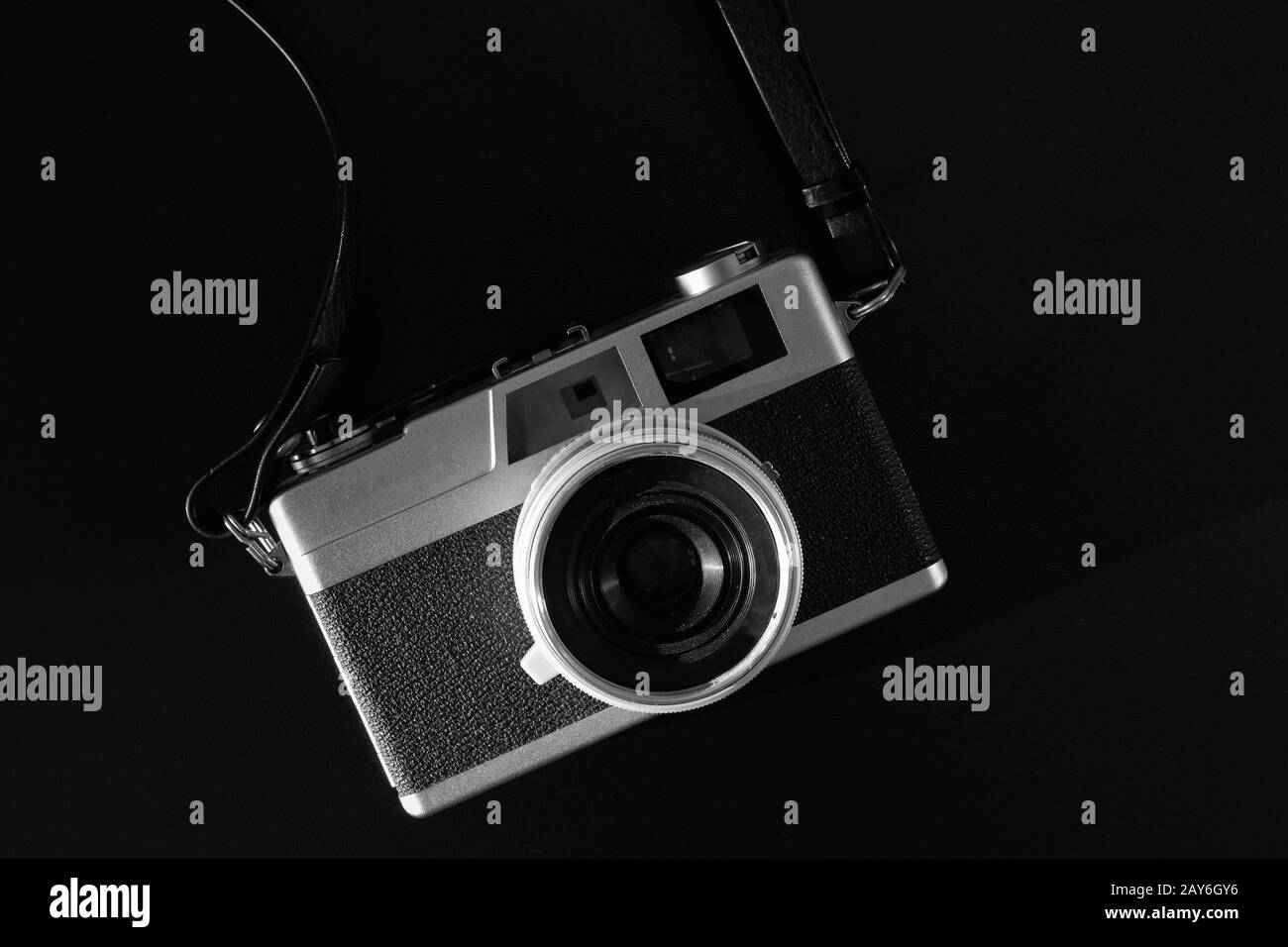 Vintage film camera against dark background Stock Photo - Alamy