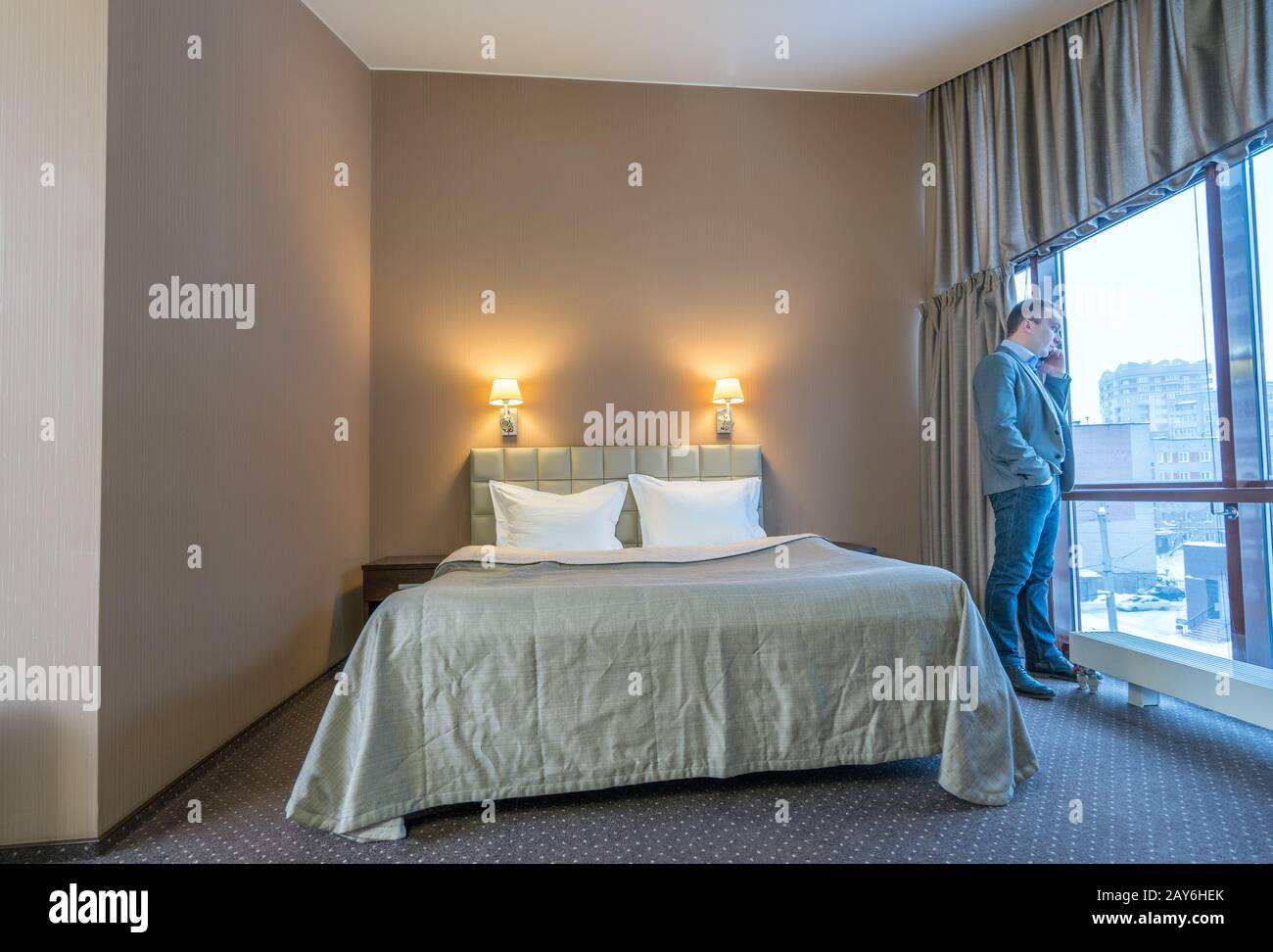 Businessman arrival in room hi-res stock photography and images - Alamy