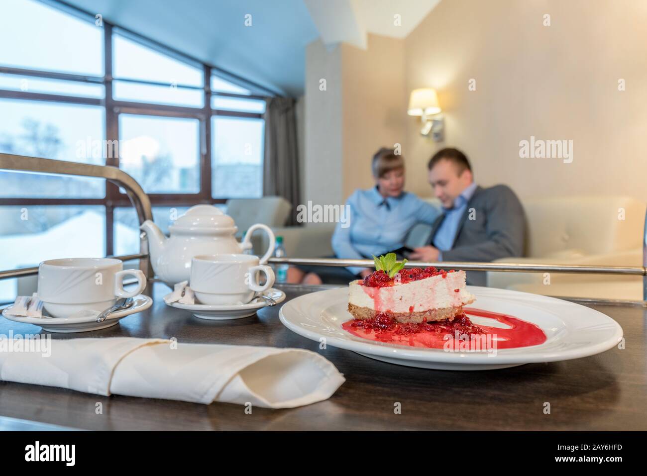 Meal delivery in room. Cake and utensils for tea Stock Photo - Alamy