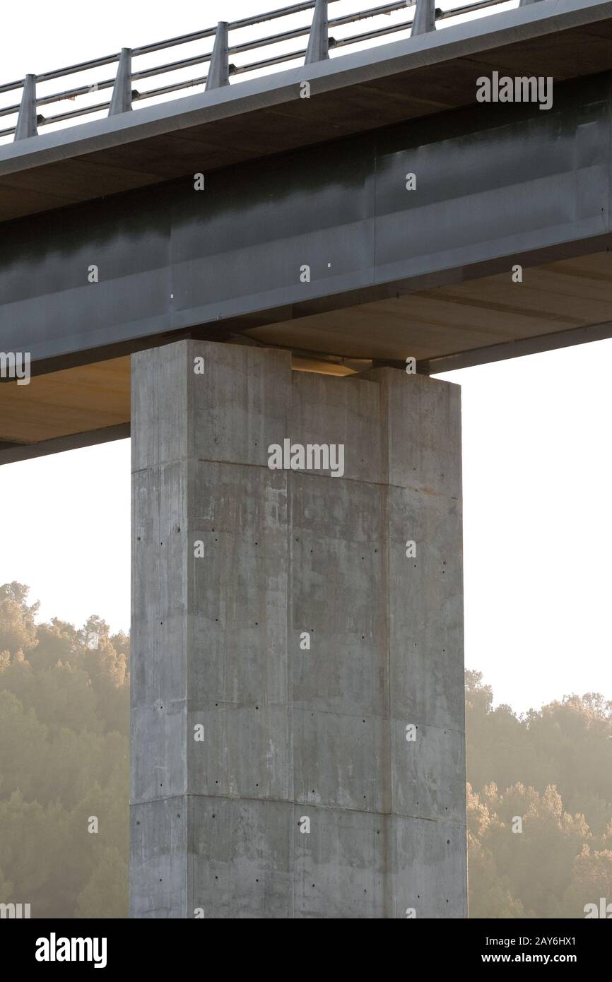 Bridge structure from underneath with background forest Stock Photo - Alamy