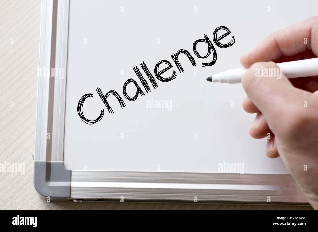 Challenge written on whiteboard Stock Photo - Alamy