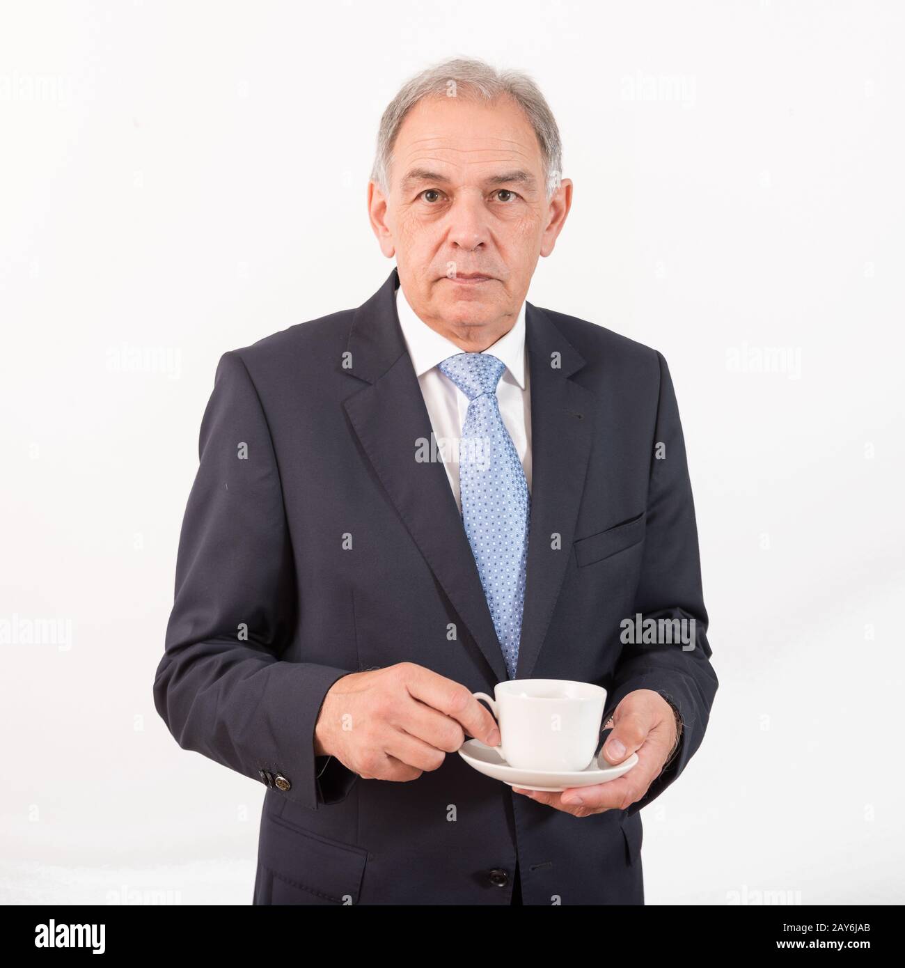Man as an official, representative, agent or salesman with coffee cup ...