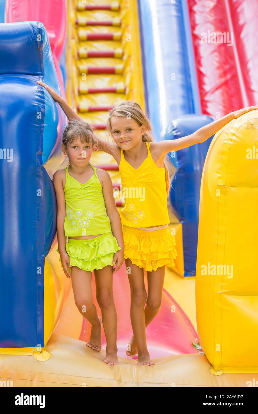 Two children stand hi-res stock photography and images - Alamy