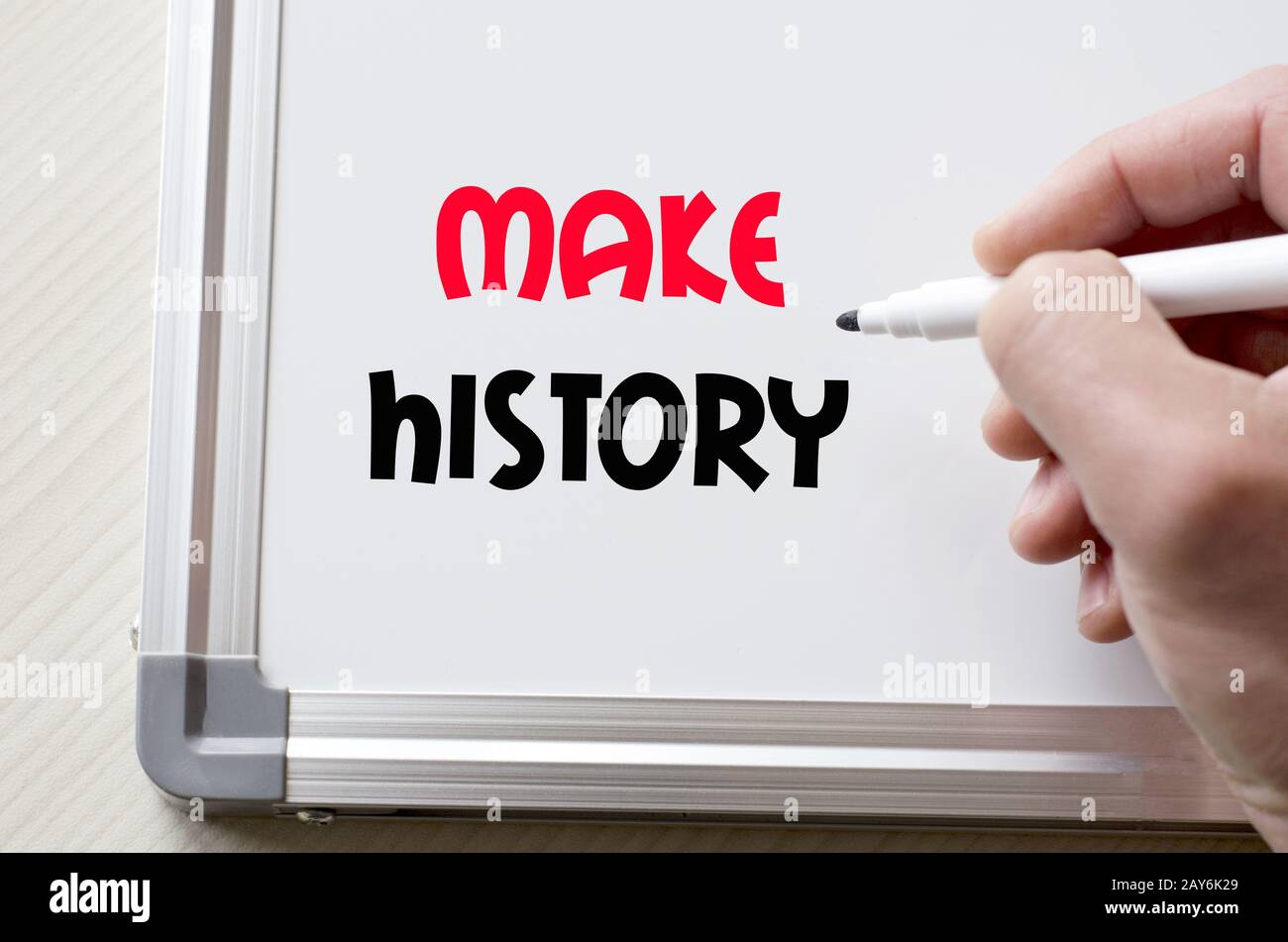 Make history written on whiteboard Stock Photo - Alamy