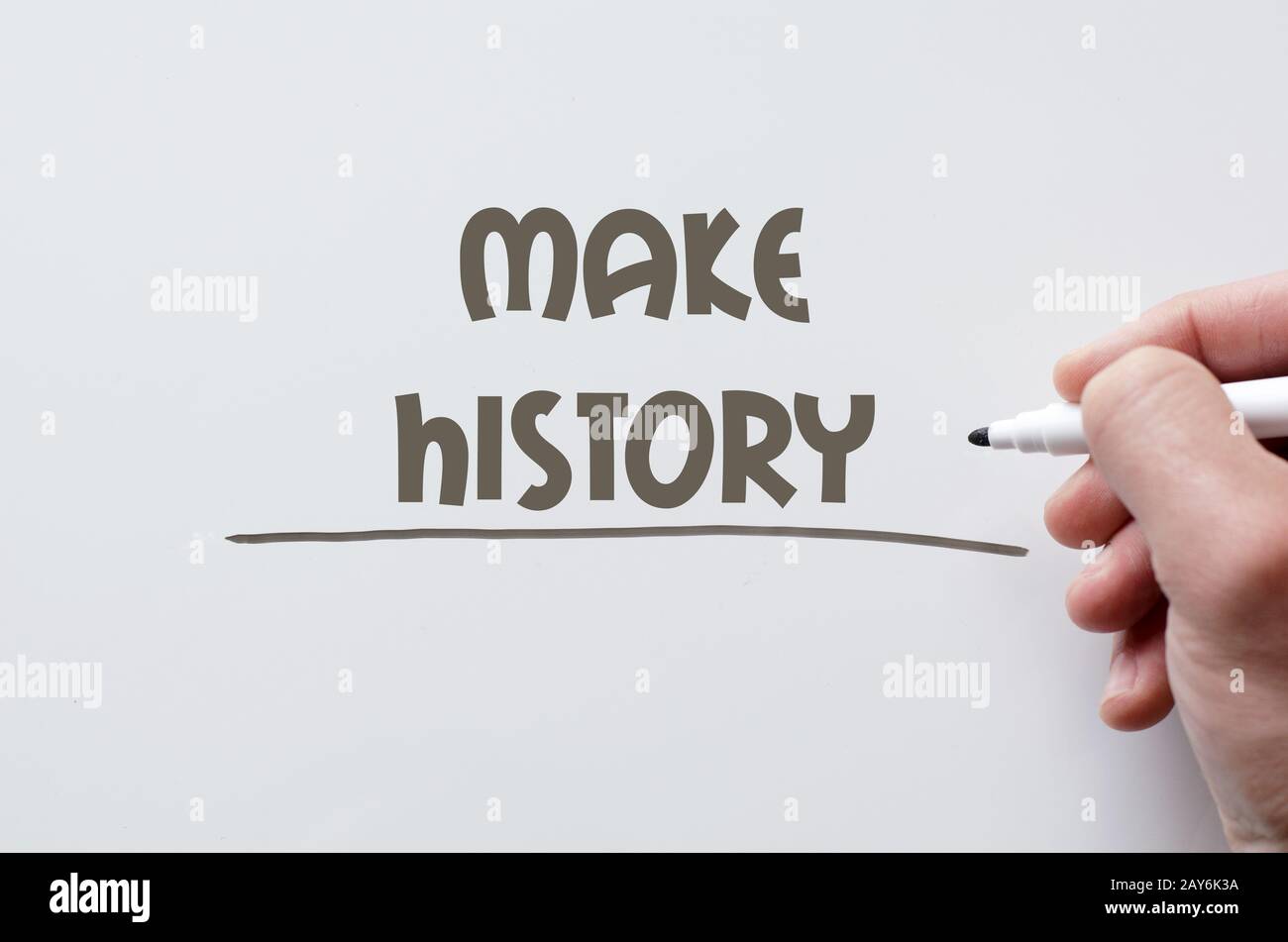 Make history written on whiteboard Stock Photo - Alamy