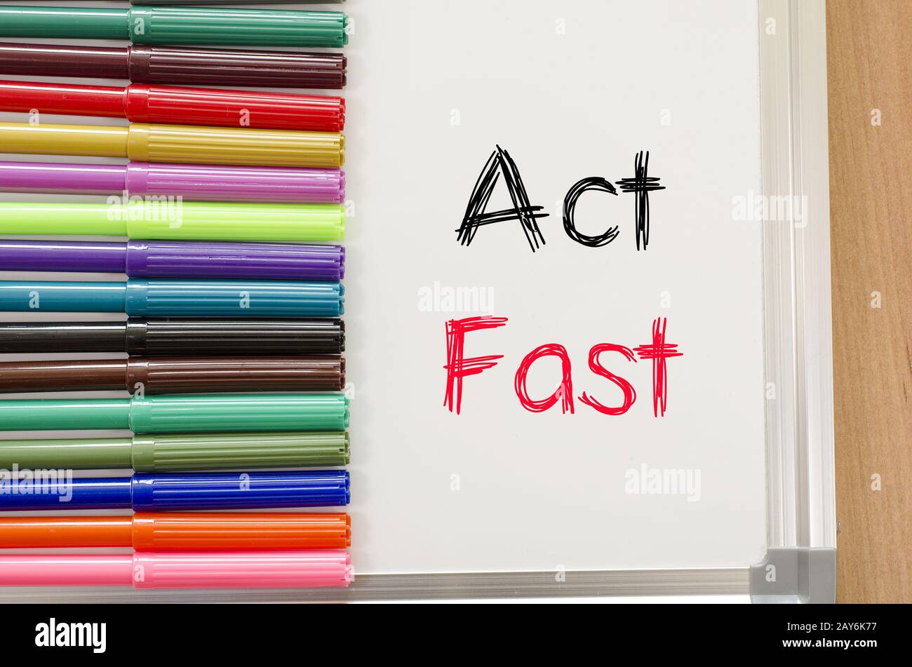 Act fast text concept Stock Photo - Alamy