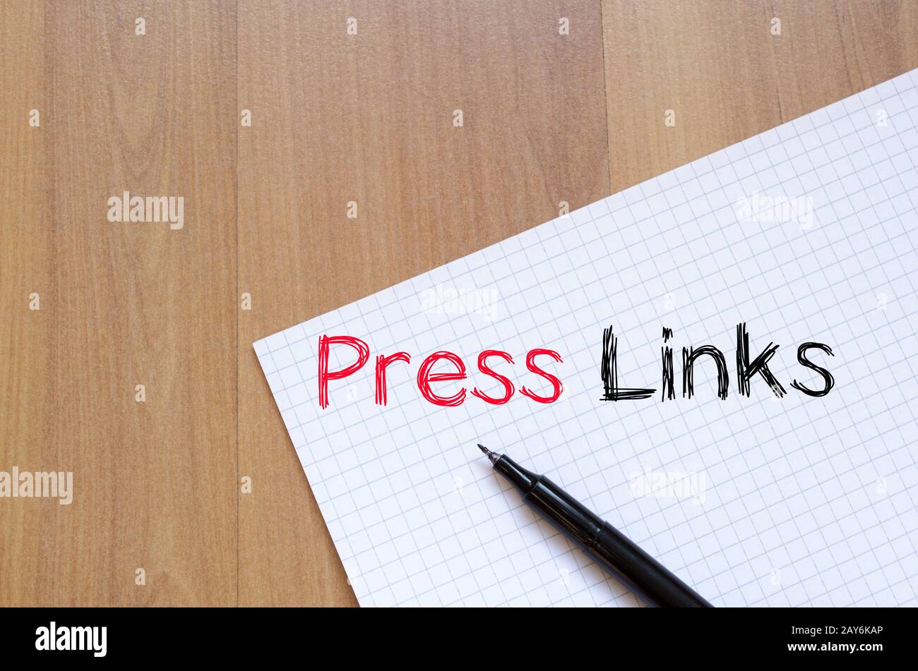 Press links concept on notebook Stock Photo - Alamy