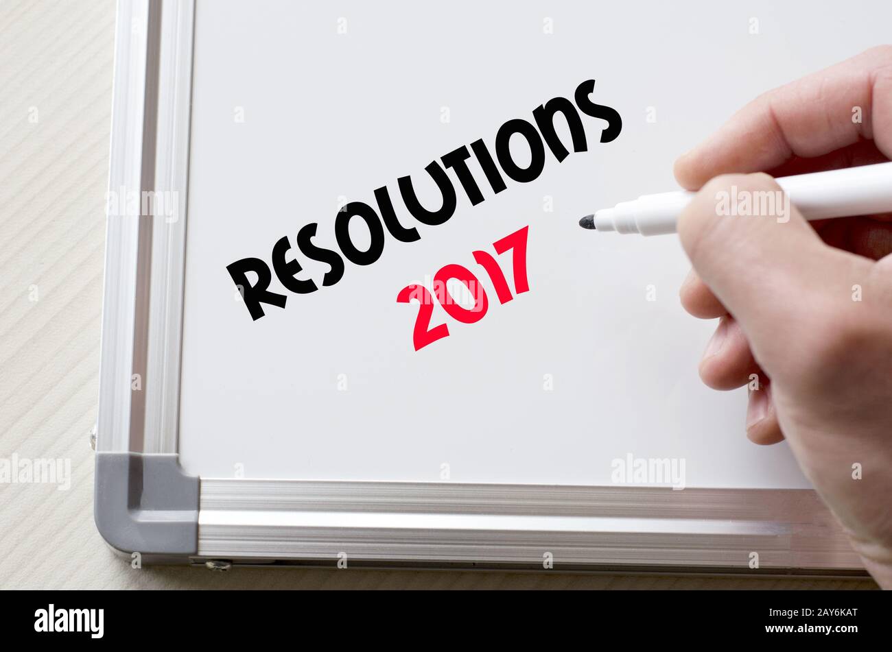 Resolutions 2017 written on whiteboard Stock Photo - Alamy