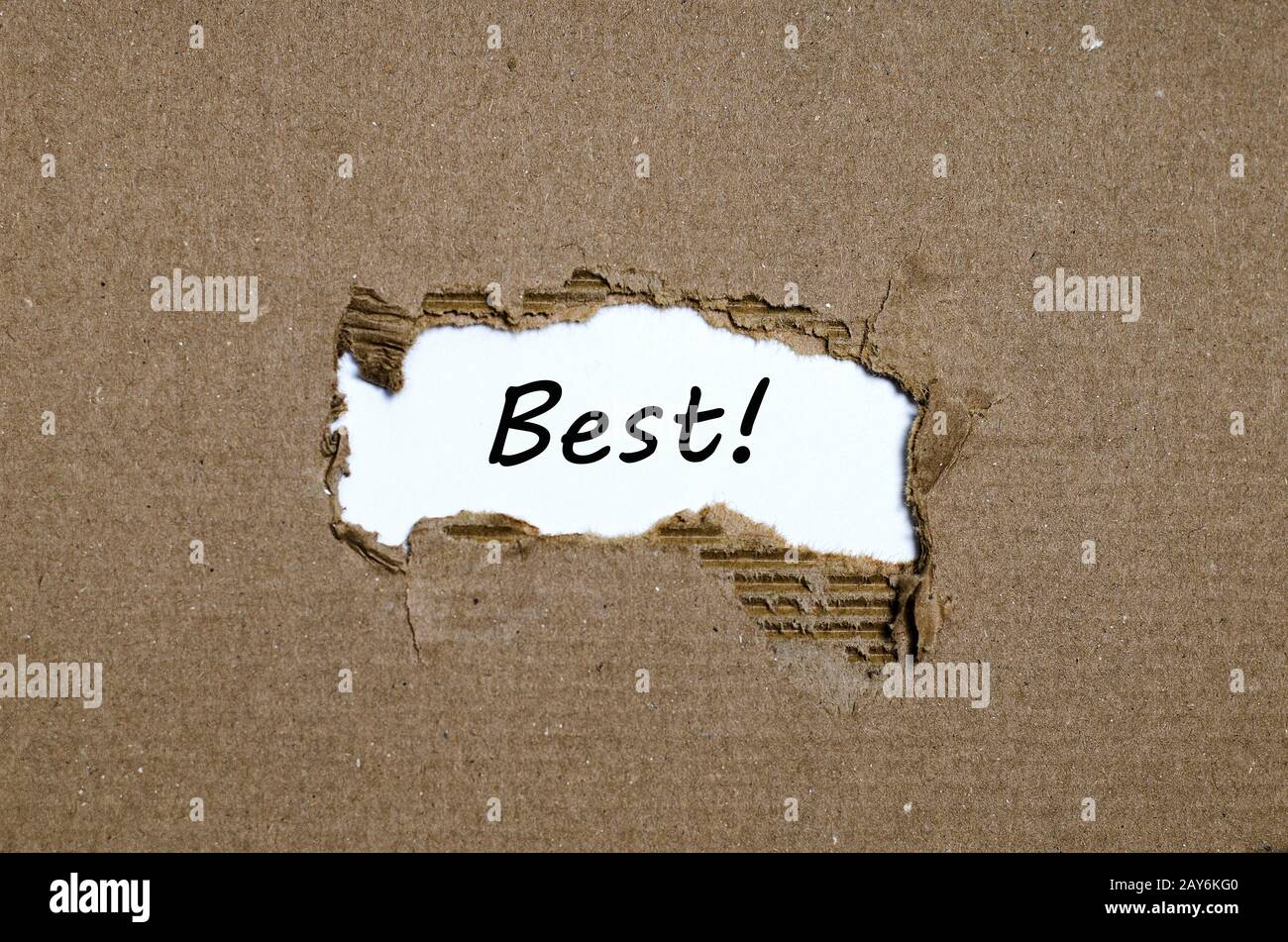 The word best appearing behind torn paper Stock Photo - Alamy