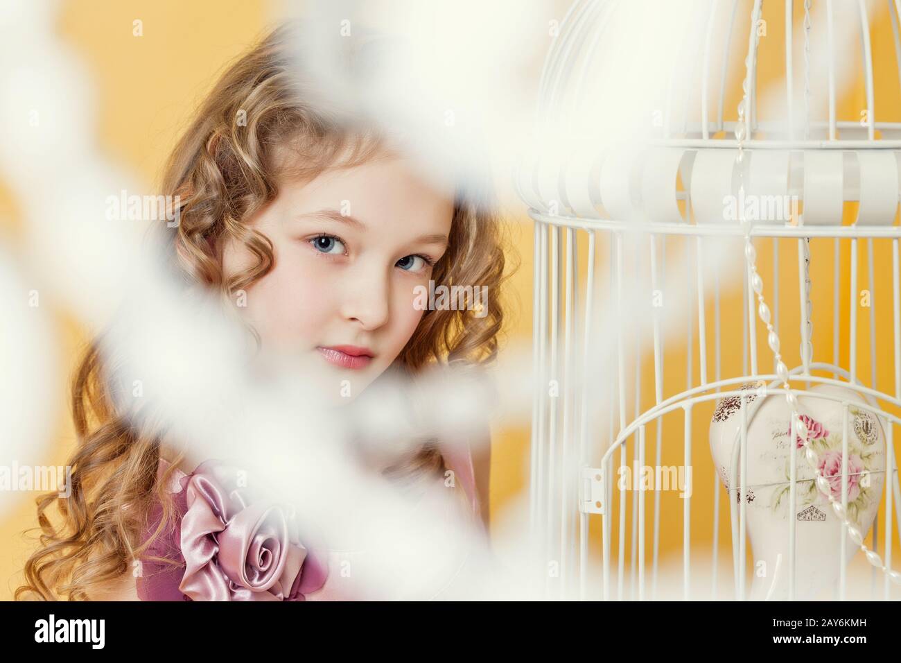 Pretty blue-eyed girl posing looking at camera Stock Photo - Alamy