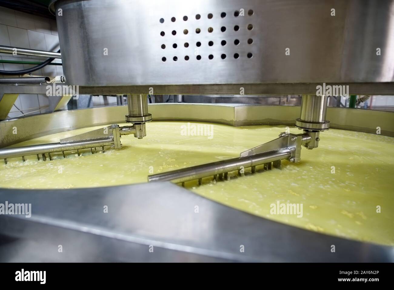 Process of mixing at dairy production line Stock Photo - Alamy